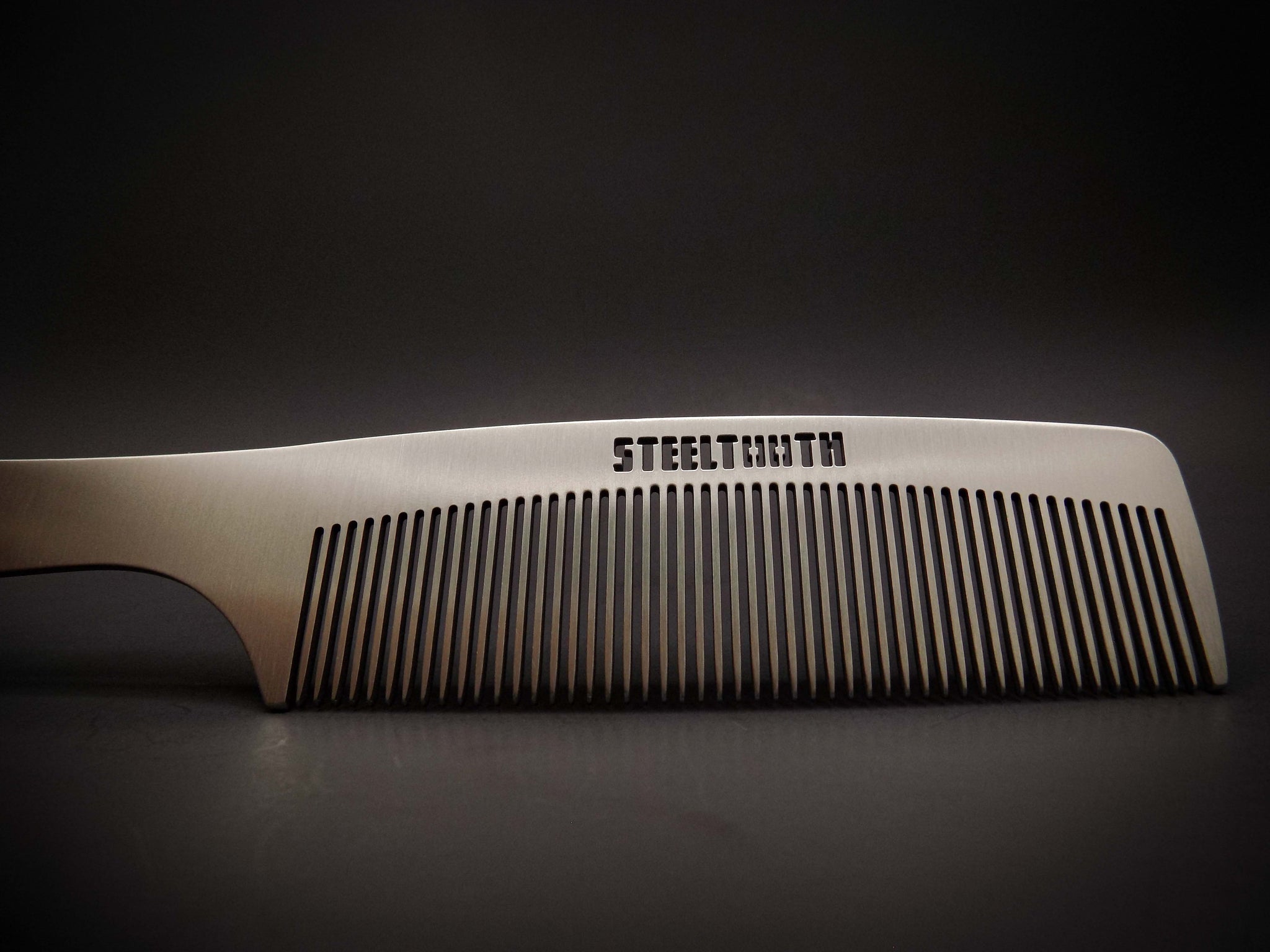 Steeltooth Comb - A comb for thick hair, beards, and pomade.